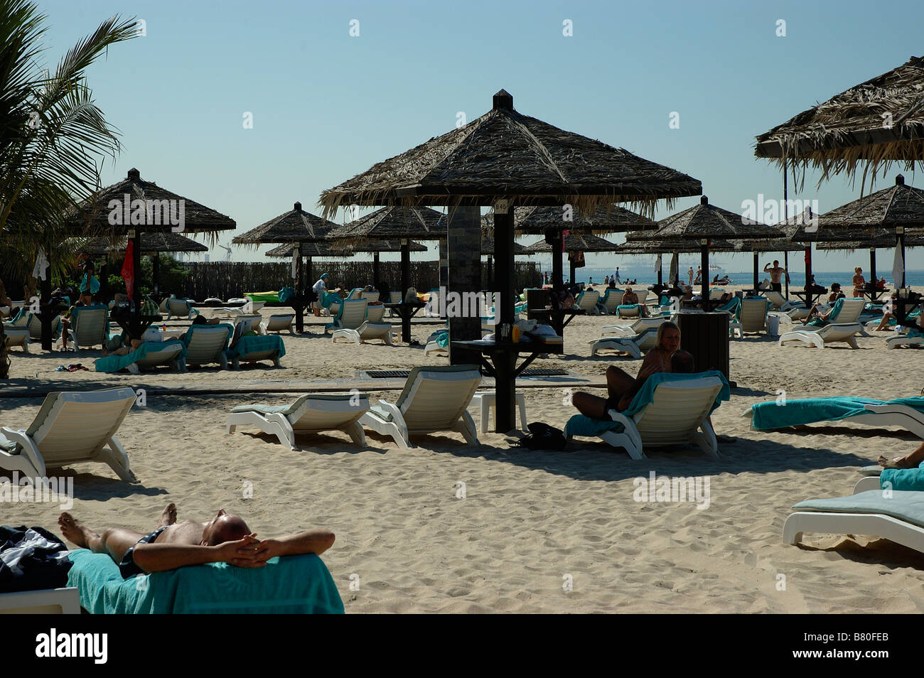 Sun bathers, Jumeirah Beach, Dubai, Arabian Gulf, Persian Gulf, UAE ...