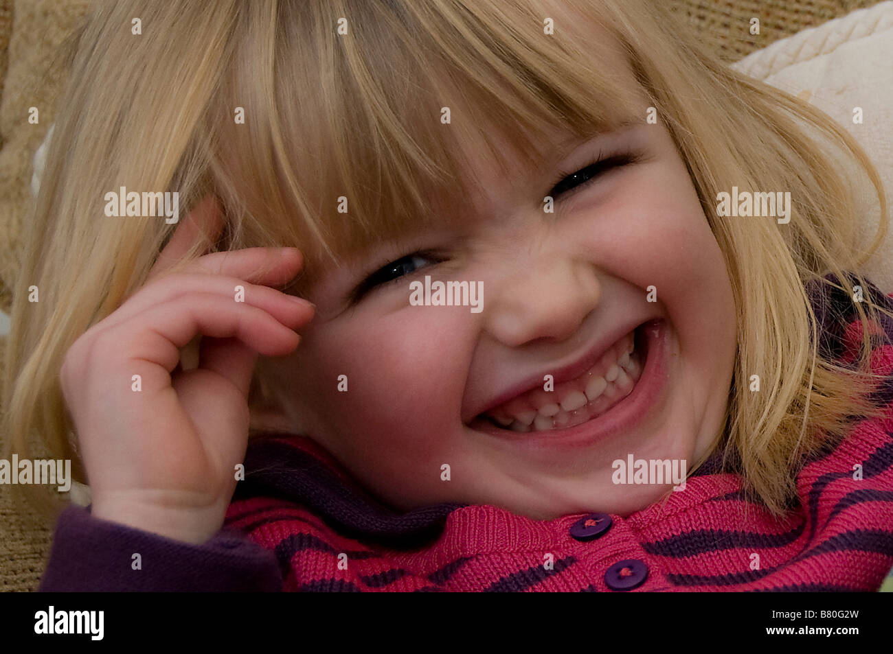 Smiling face of little girl Stock Photo - Alamy