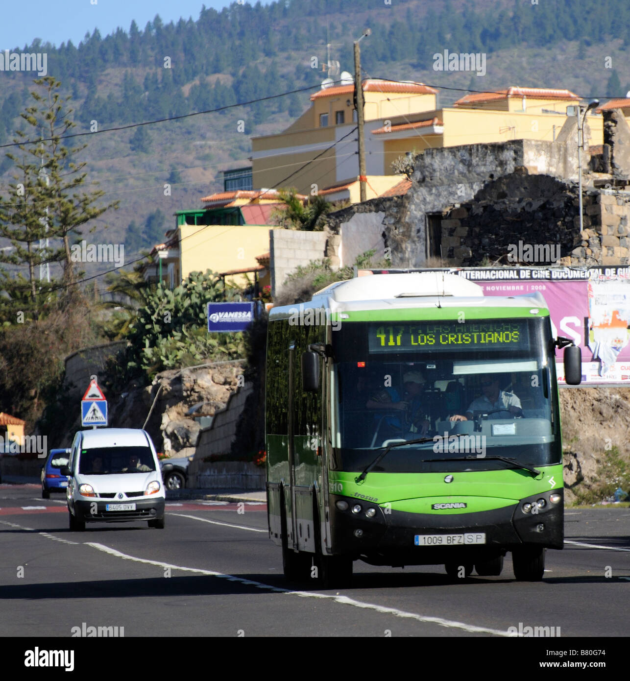Green public bus passing through Tejina on the island of Tenerife ...
