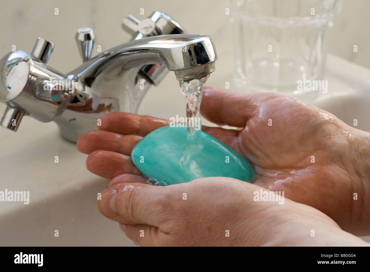Washing hands with soap Stock Photo - Alamy
