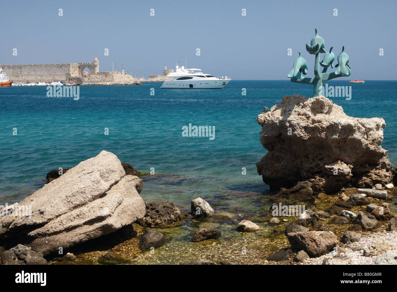Mandraki harbour in Rhodes Town Stock Photo - Alamy