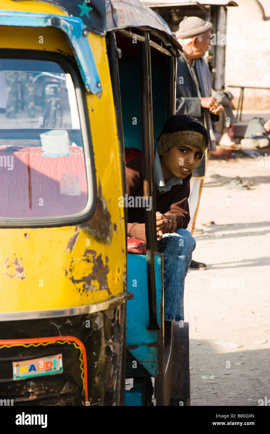 Boy in rickshaw Bikaner Rajasthan India Stock Photo - Alamy