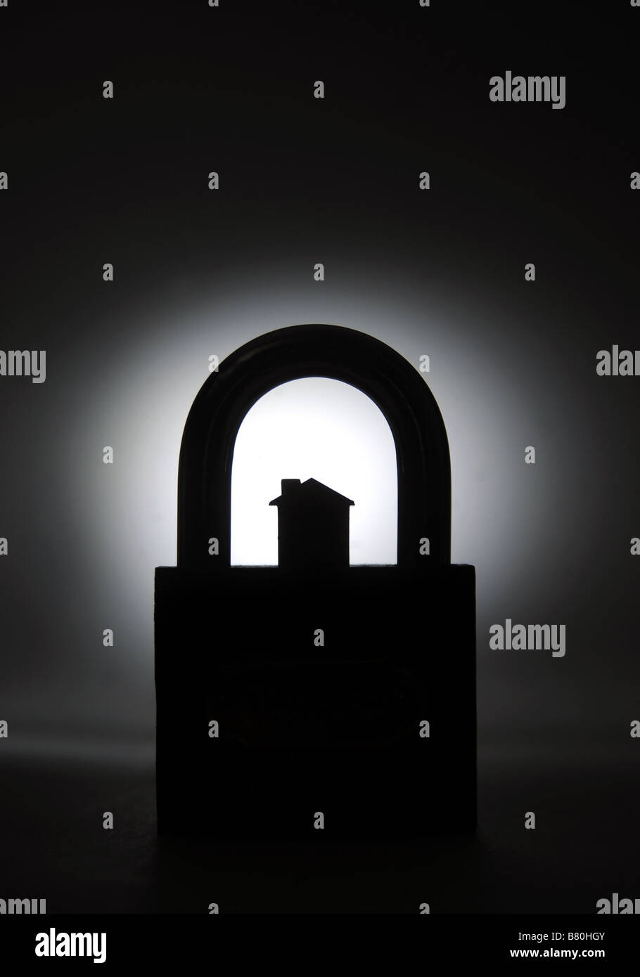 SMALL HOUSE PROTECTED BY PADLOCK Stock Photo - Alamy