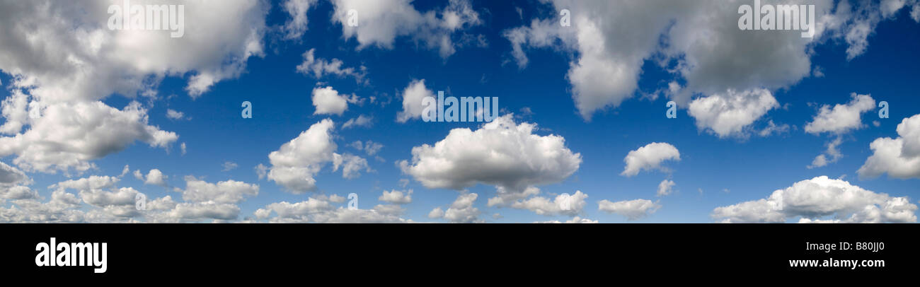 Panoramic Blue Sky with White Fluffy Clouds Stock Photo - Alamy