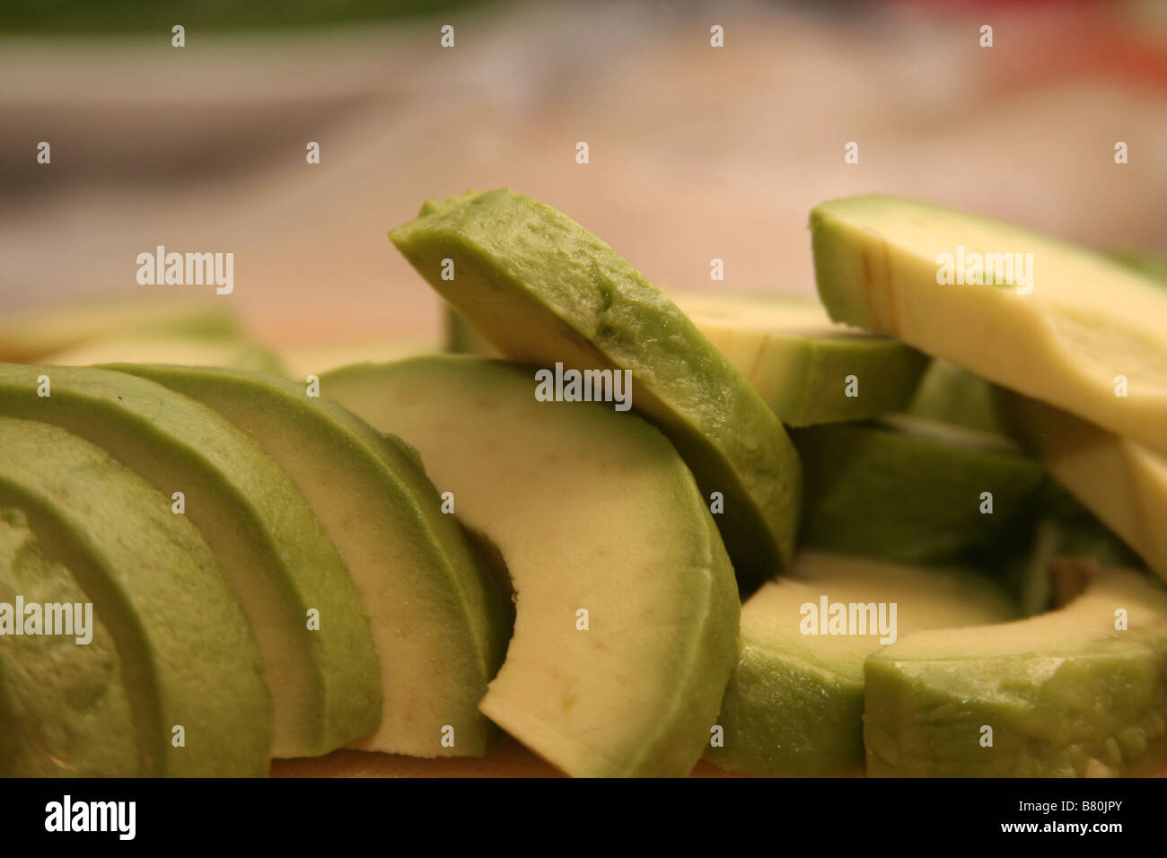Sliced peeled avocado (persea americana Stock Photo - Alamy