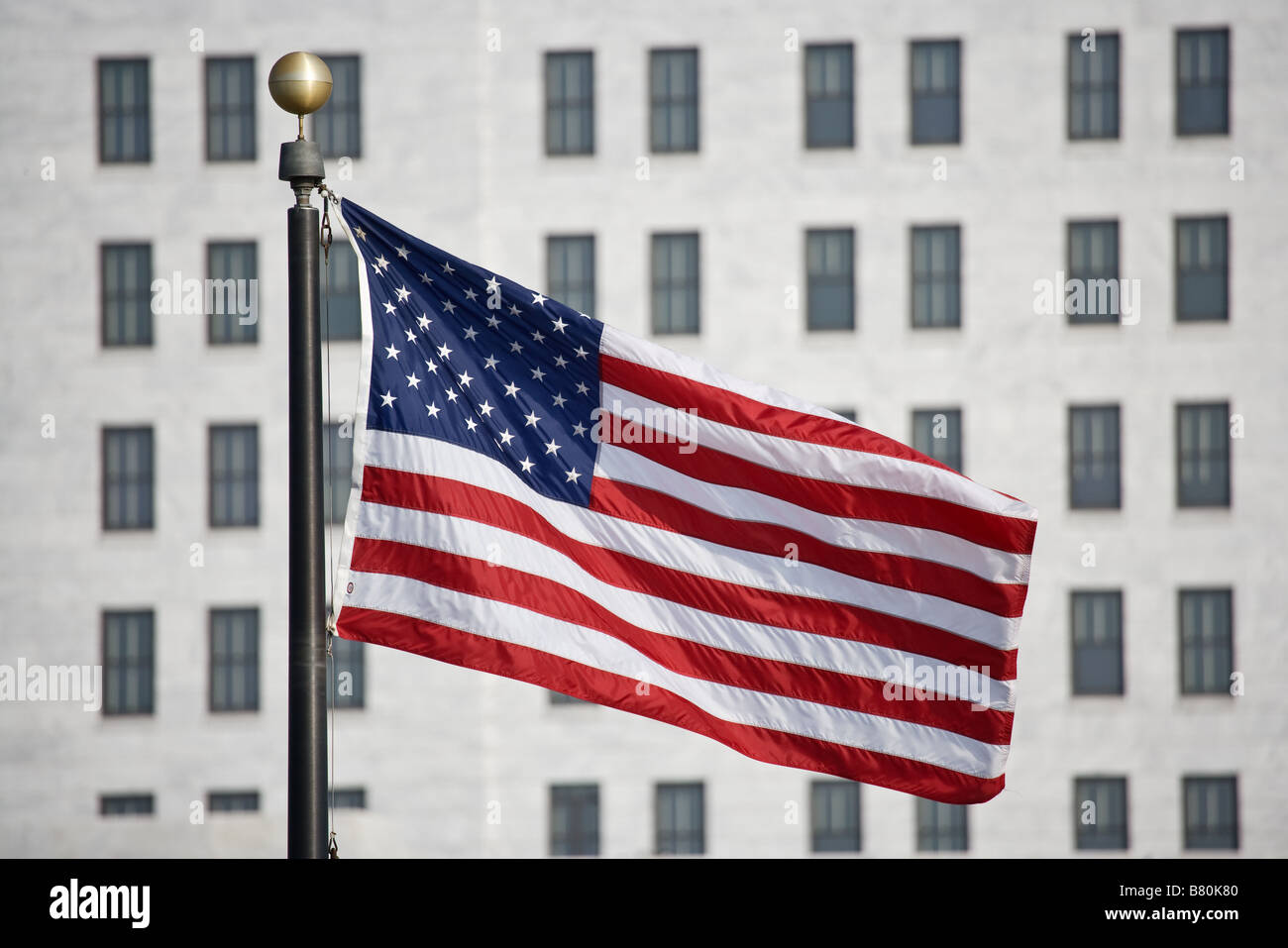 An American flag blowing in the wind Stock Photo - Alamy
