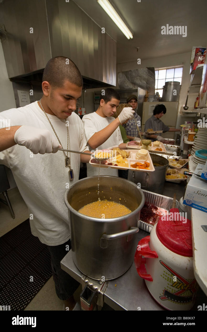 Volunteers cook traditional Christmas dinner during holiday activities ...