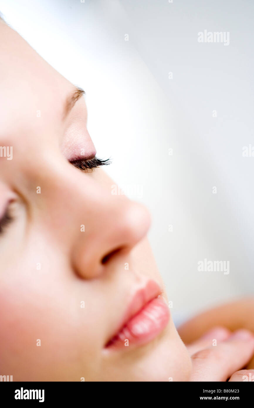 Close up to a young woman s right face side view eyes closed Stock ...