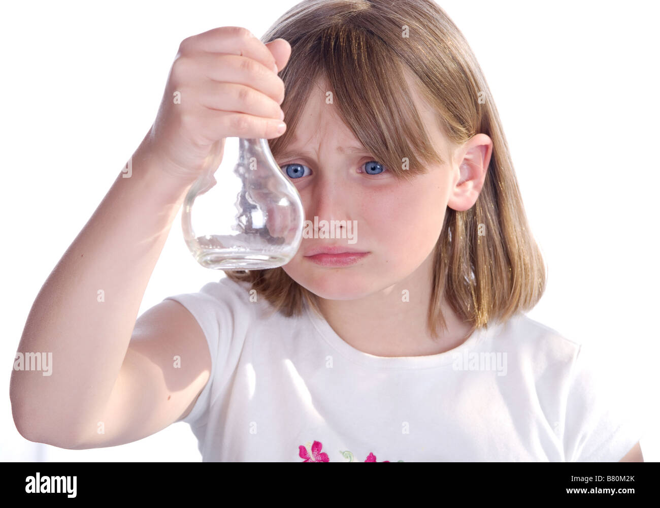 girl isolated on white looking at an empty science bottle Stock Photo ...
