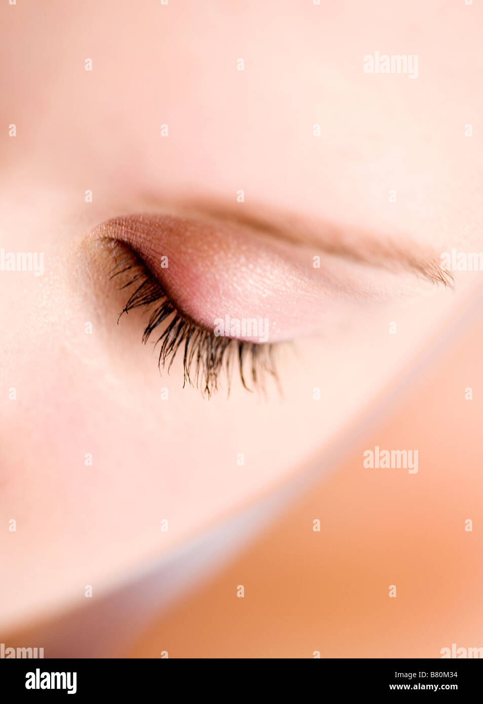 Close up to one closed eye and eyebrow Stock Photo - Alamy