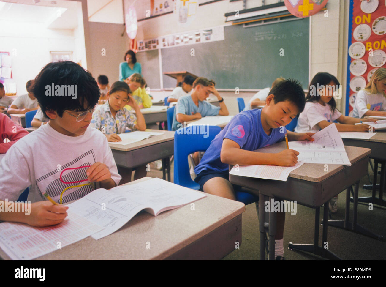 Junior high school students take progress test in class Stock Photo - Alamy