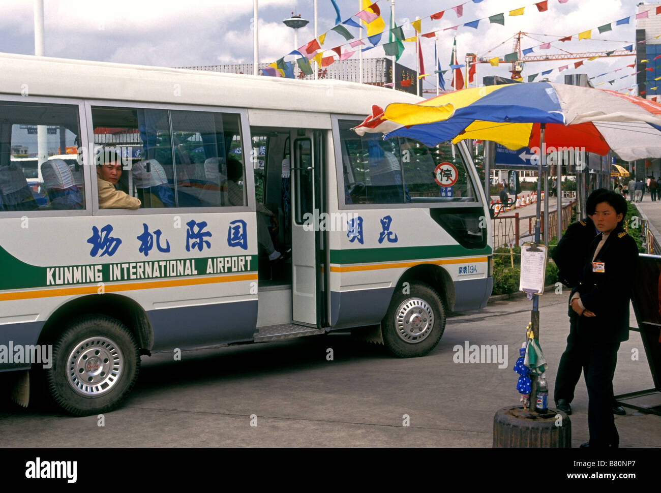 People ride riding shuttle bus at Kunming International Airport Kunming ...