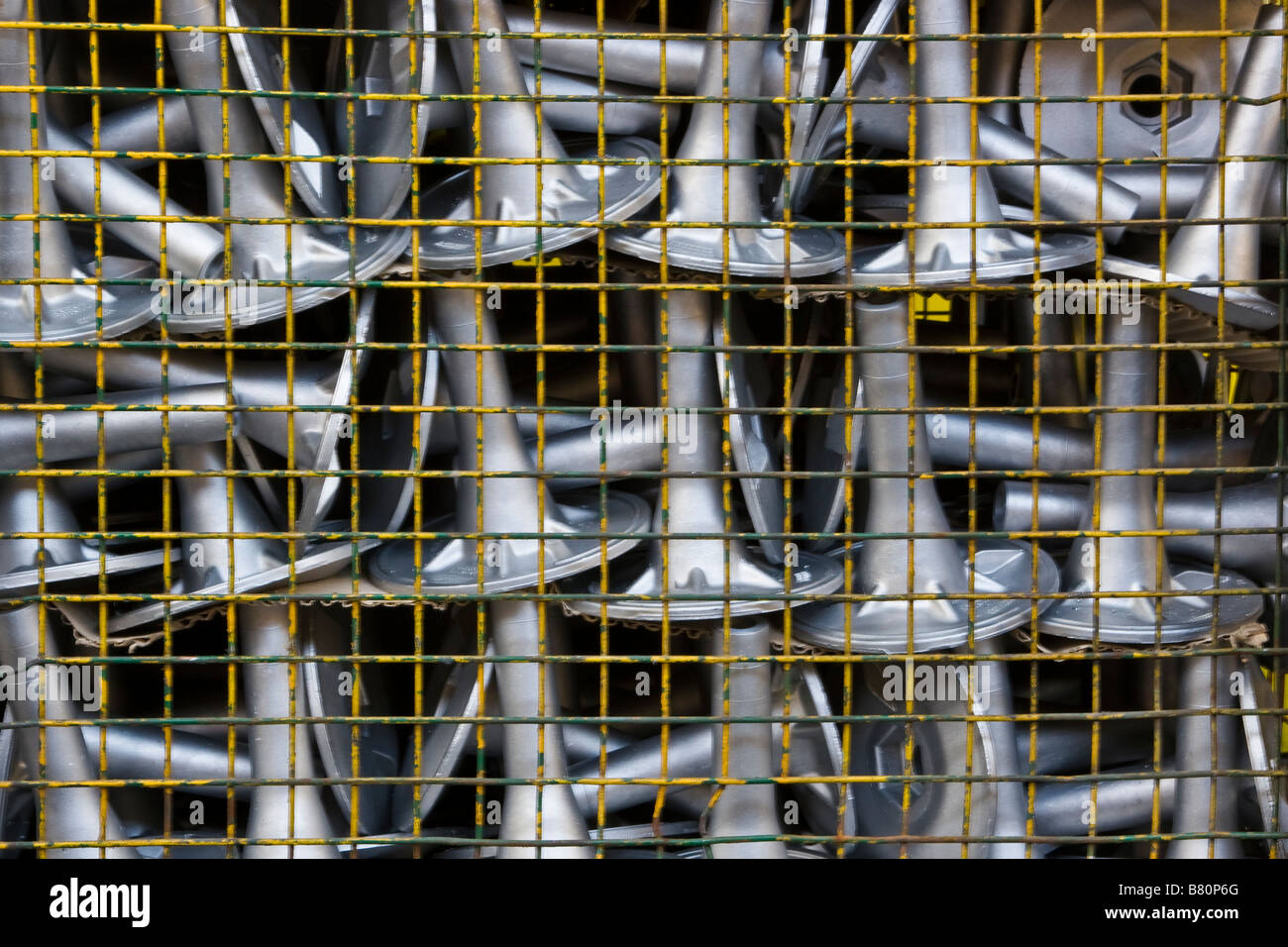 Metal components in steel cage hi-res stock photography and images - Alamy