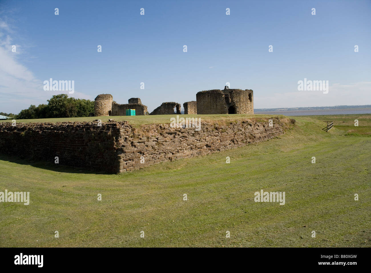 Flint castle on the shore of the River Dee Estuary in Cheshire, England ...