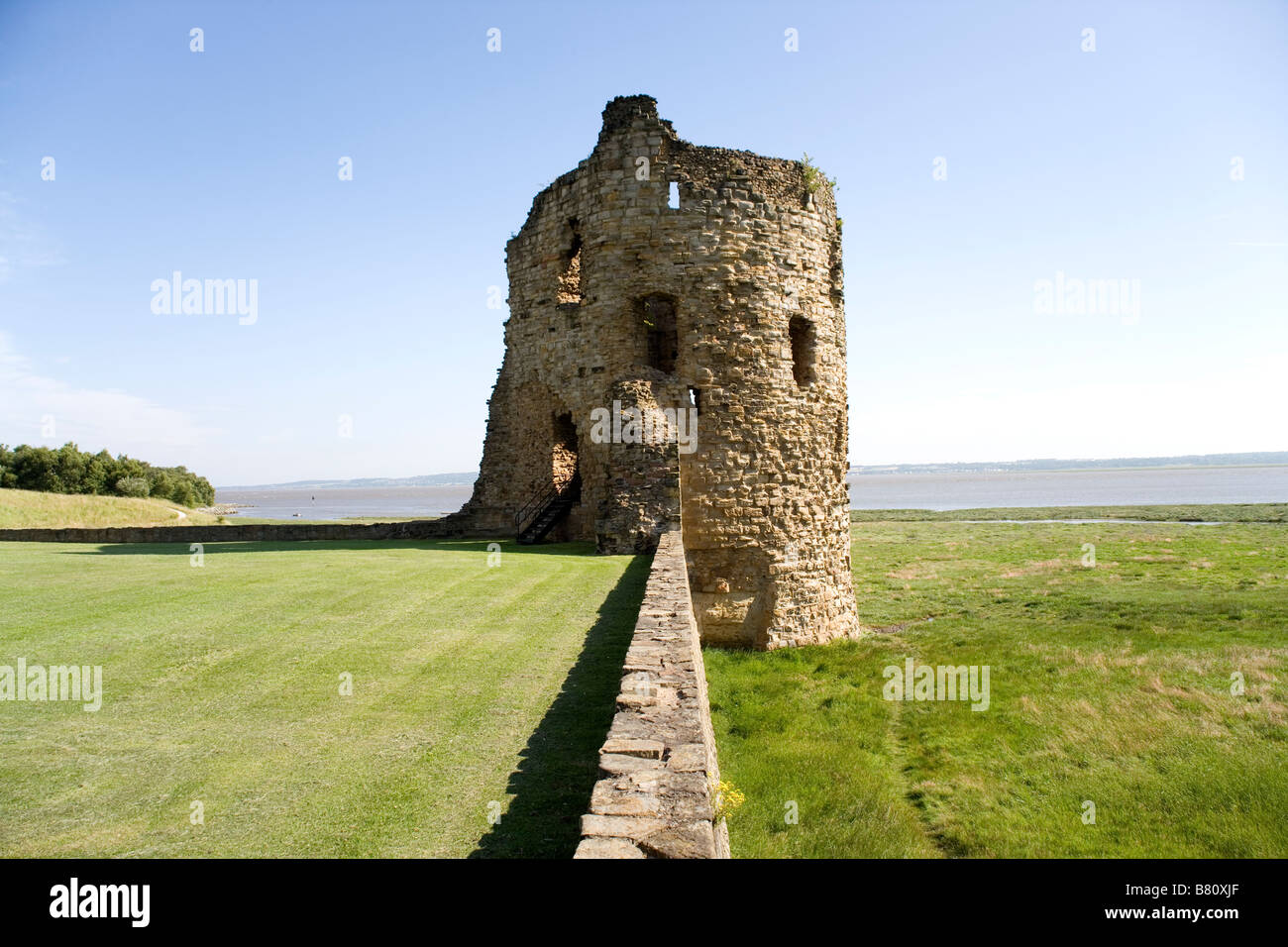 Flint castle on the shore of the River Dee Estuary in Cheshire, England ...