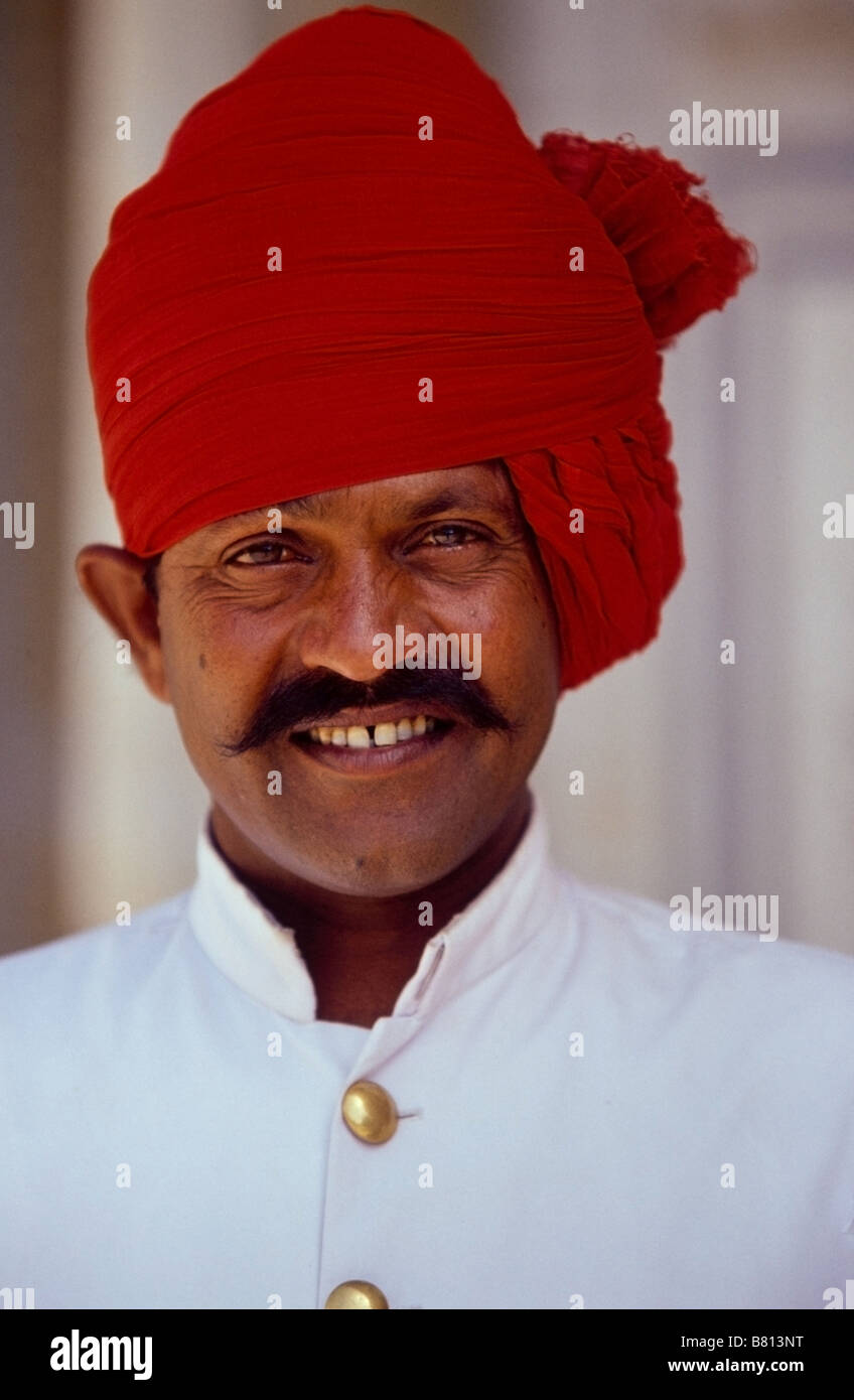 Guard in the city Palace of Jaipur wearing a red turban Stock Photo - Alamy