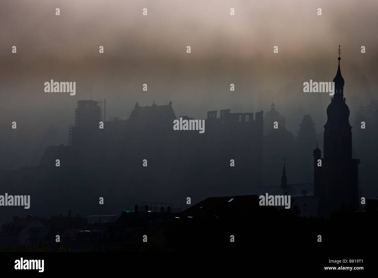 Gloomy picture of Heidelberg castle in fog Stock Photo - Alamy