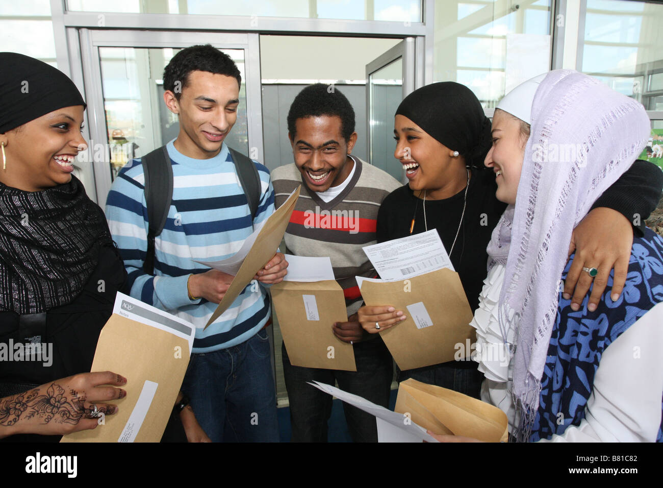 Students opening and comparing A-Level exam results Stock Photo - Alamy