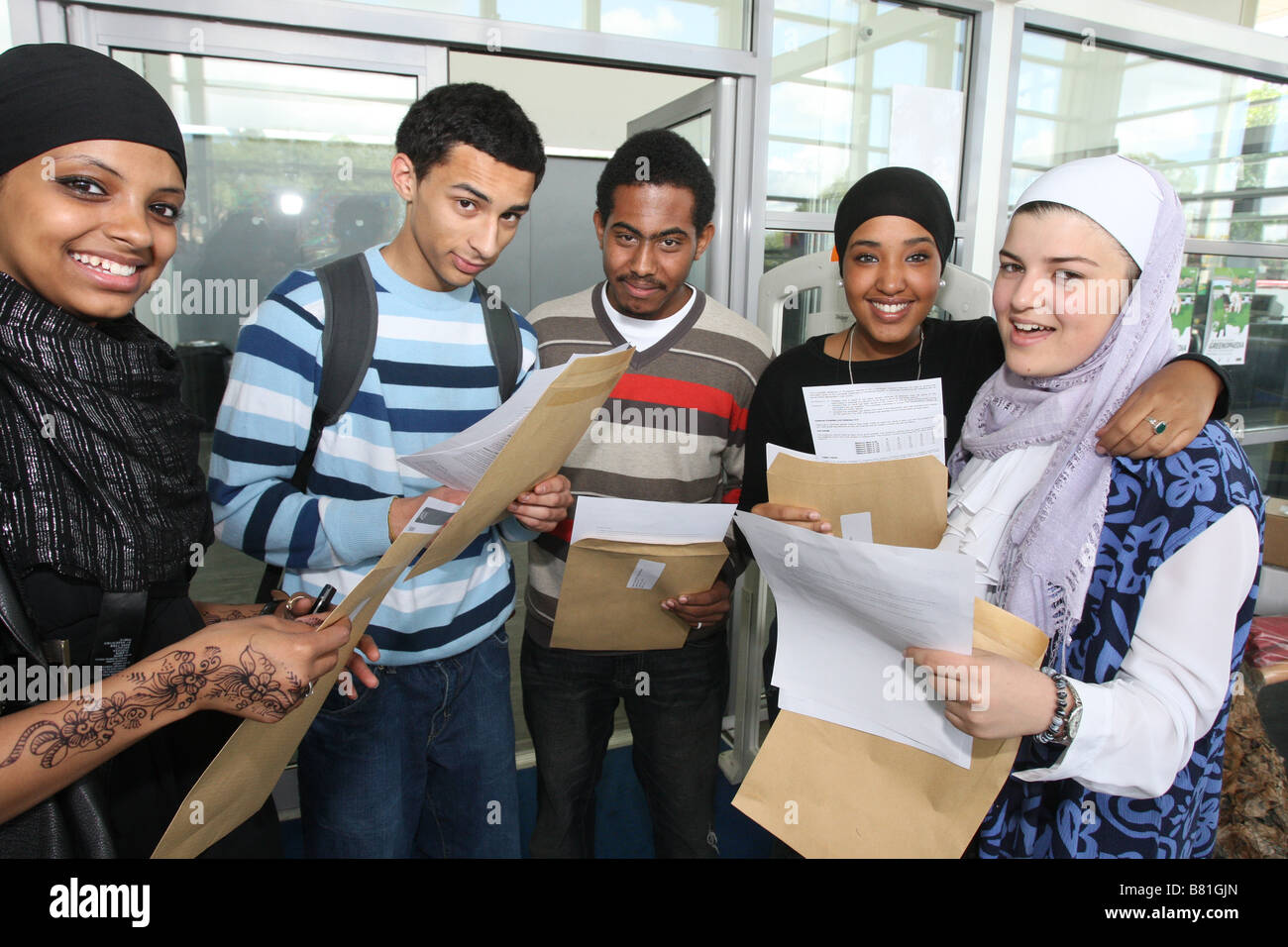 Students opening and comparing A-Level exam results Stock Photo - Alamy