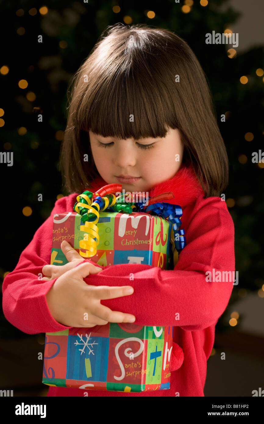 Little girl with present Stock Photo - Alamy