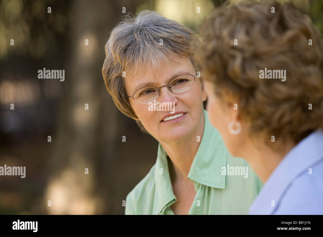 Two friends understanding each other hi-res stock photography and ...