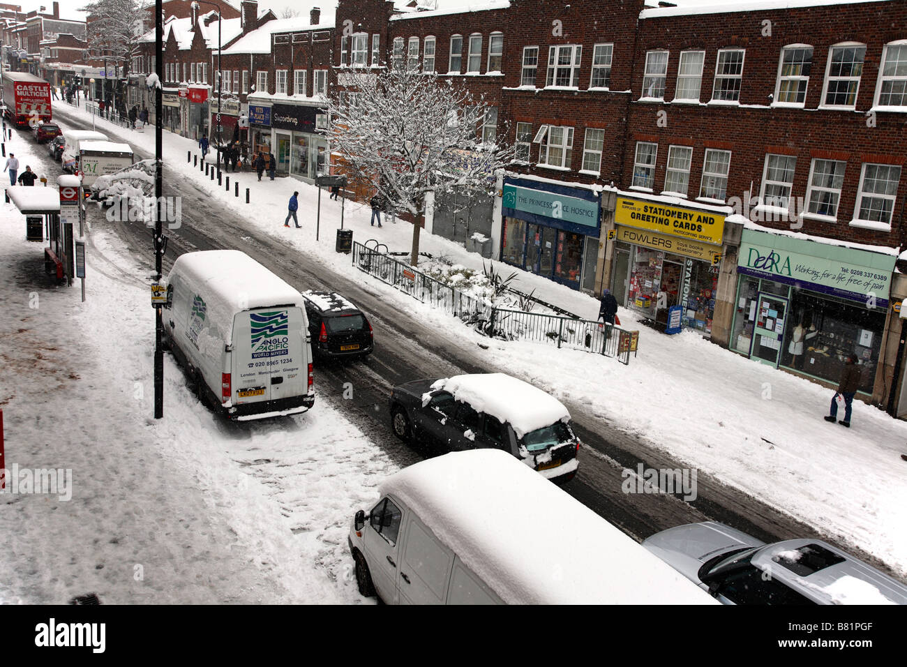 Street scene of snow on a London road Stock Photo - Alamy