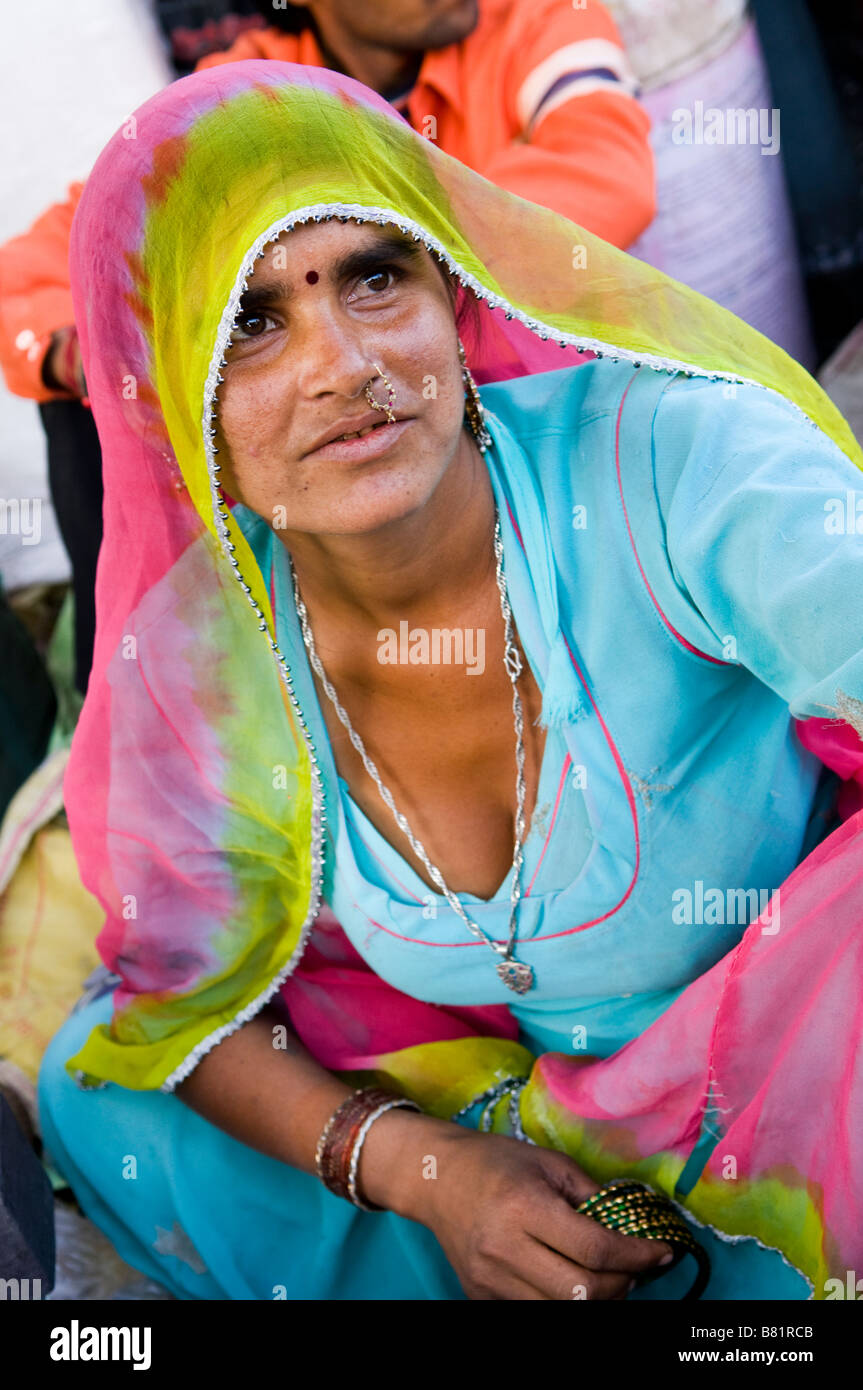 An Indian woman wearing a very colorful sari Stock Photo - Alamy