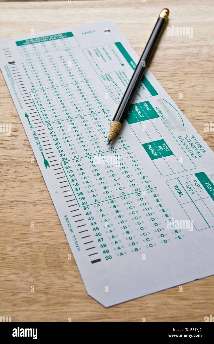 Blank machine scoring form with pencil Stock Photo - Alamy