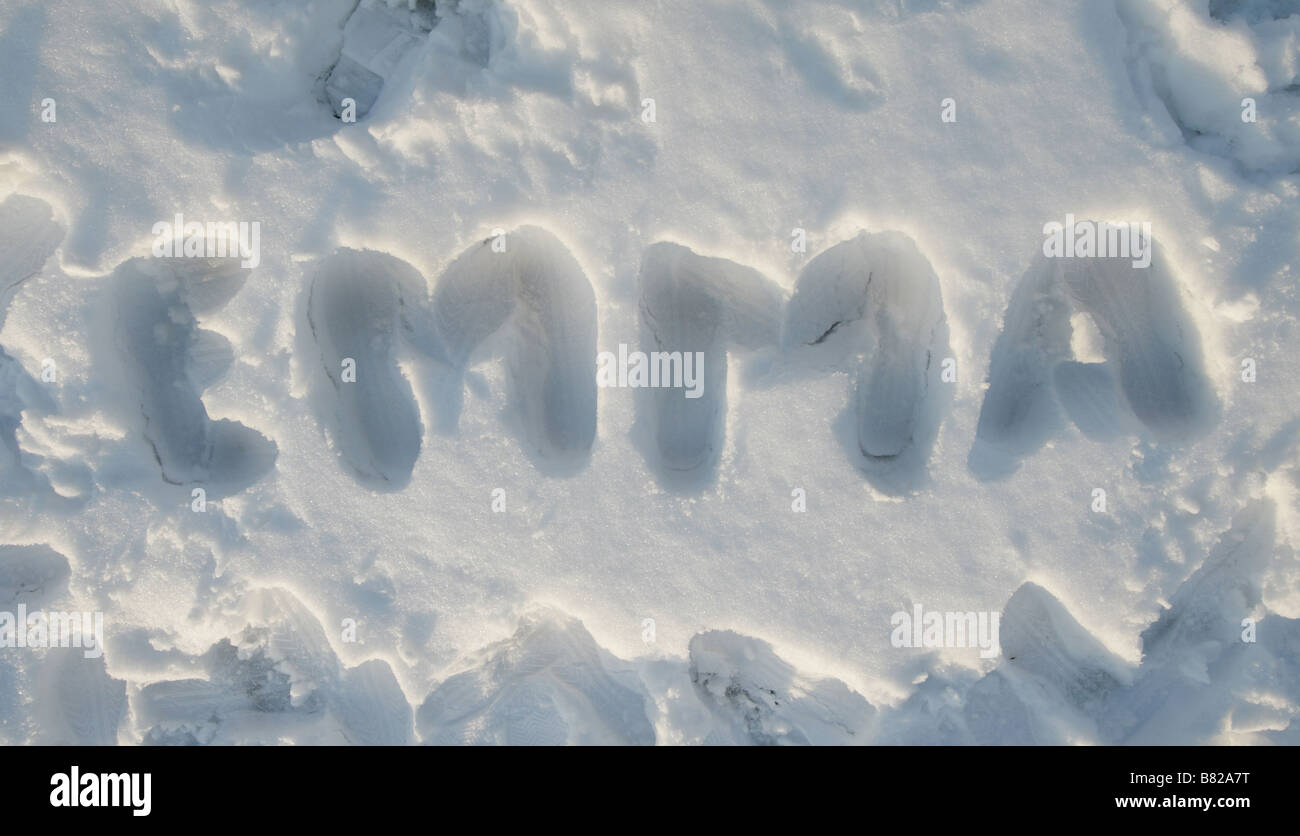 The name 'Emma' written in snow in footprints Stock Photo - Alamy