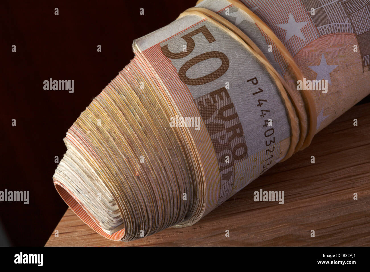 Roll of European Currency Stock Photo - Alamy