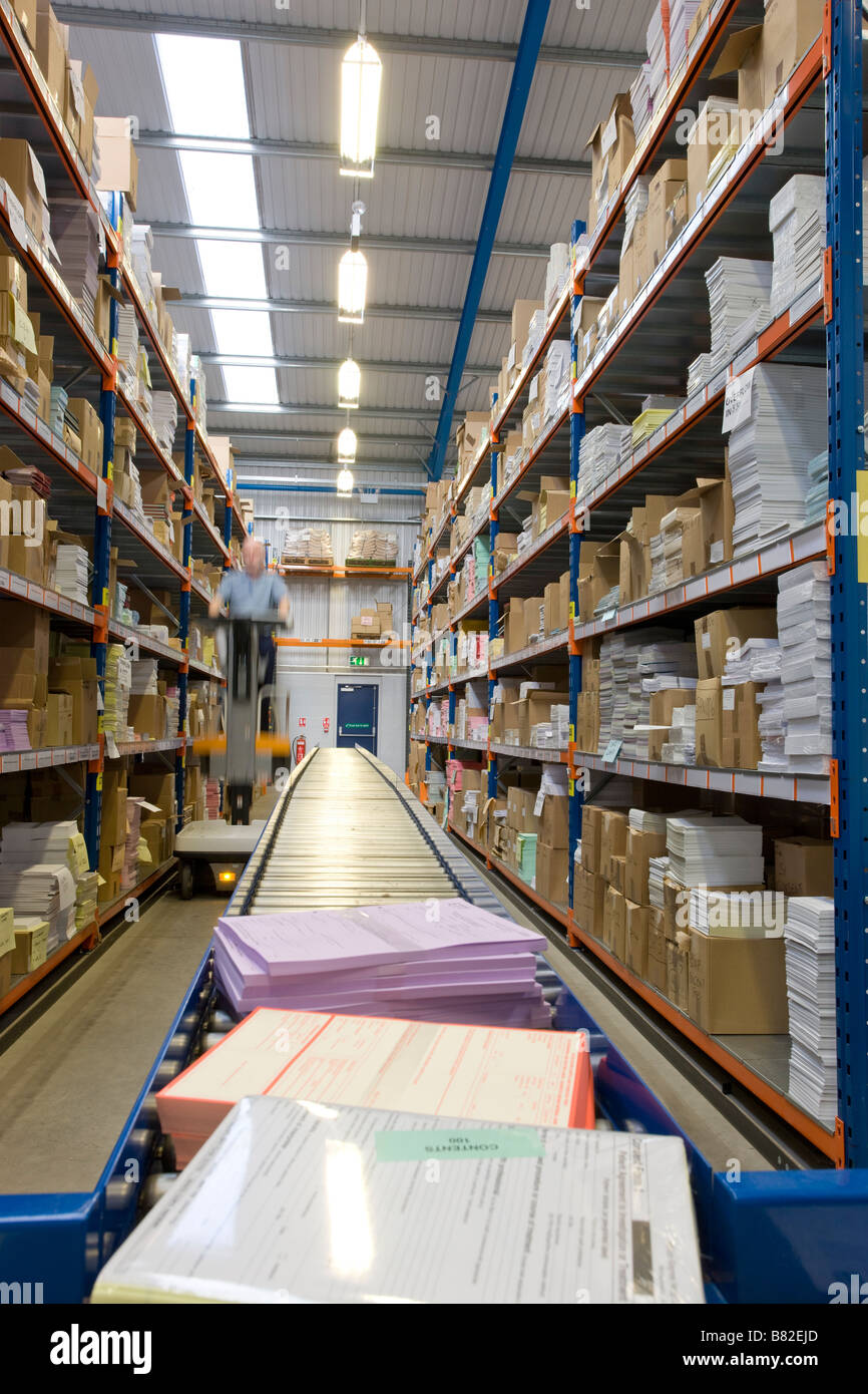 Conveyor belt and stocked shelves Stock Photo - Alamy