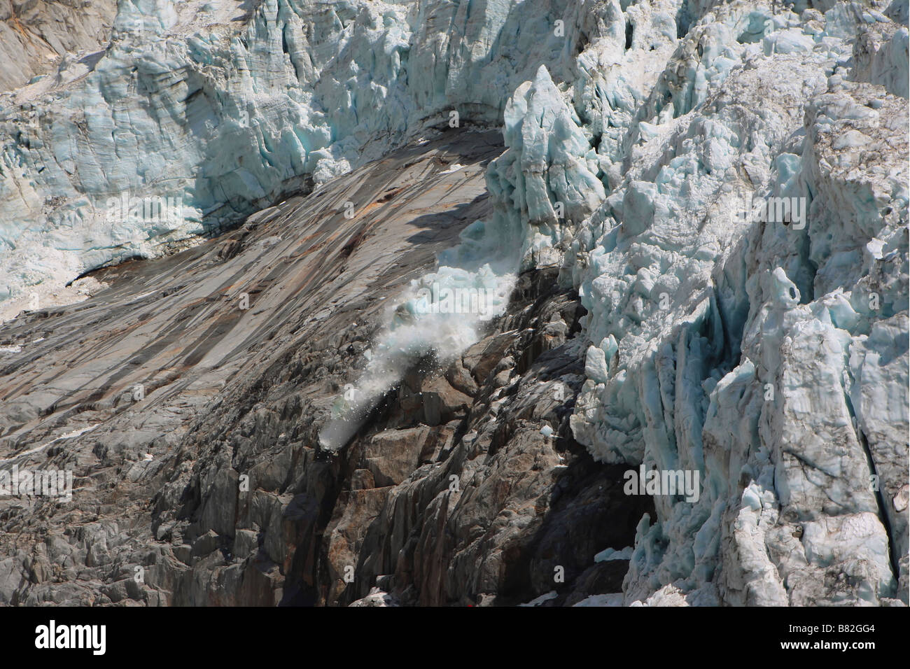 Serac breaking away from the nose of the Argentiere glacier, Chamonix ...