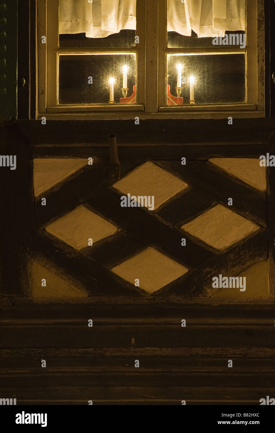 CANDLELIT CHRISTMAS WINDOW DURING ADVENT TIME AT NIGHT ALSACE FRANCE ...