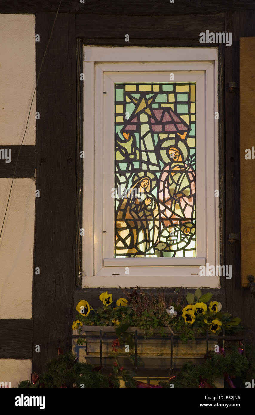ILLUMINATED CHRISTMAS WINDOW WITH A NATIVITY SCENE DURING ADVENT TIME ...