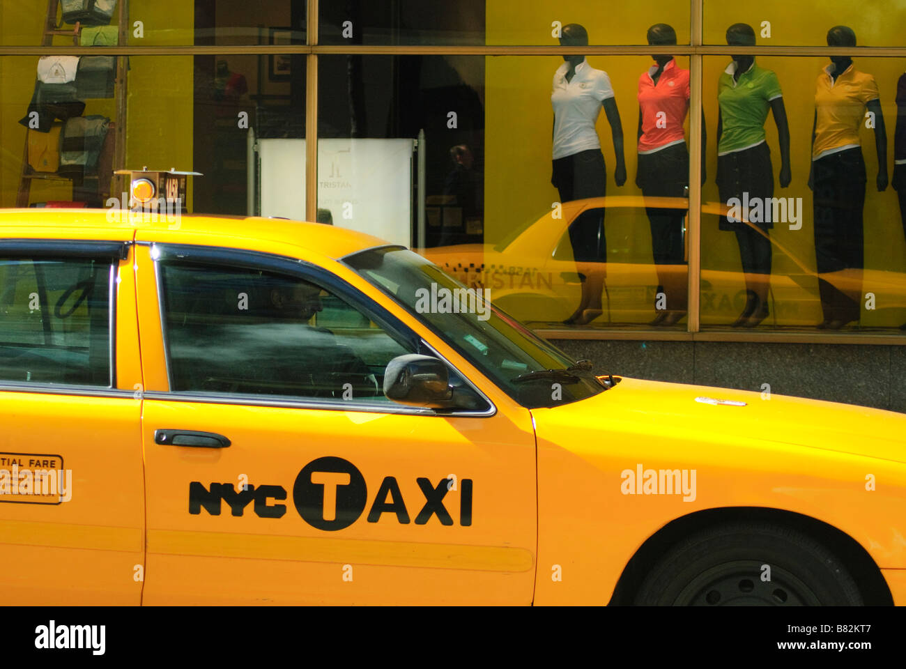 New York taxi in front of department stroe window Stock Photo - Alamy