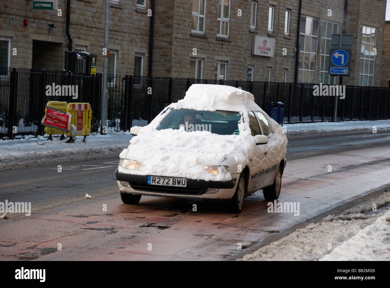 car with a snow ' mohawk ' Stock Photo - Alamy