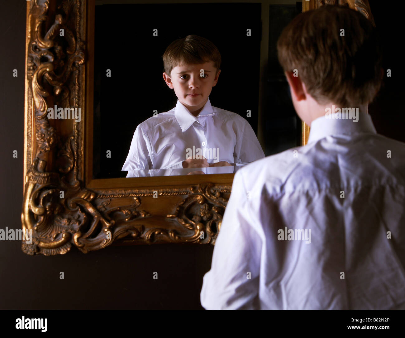 boy preparing proudly for school in shirt Stock Photo - Alamy