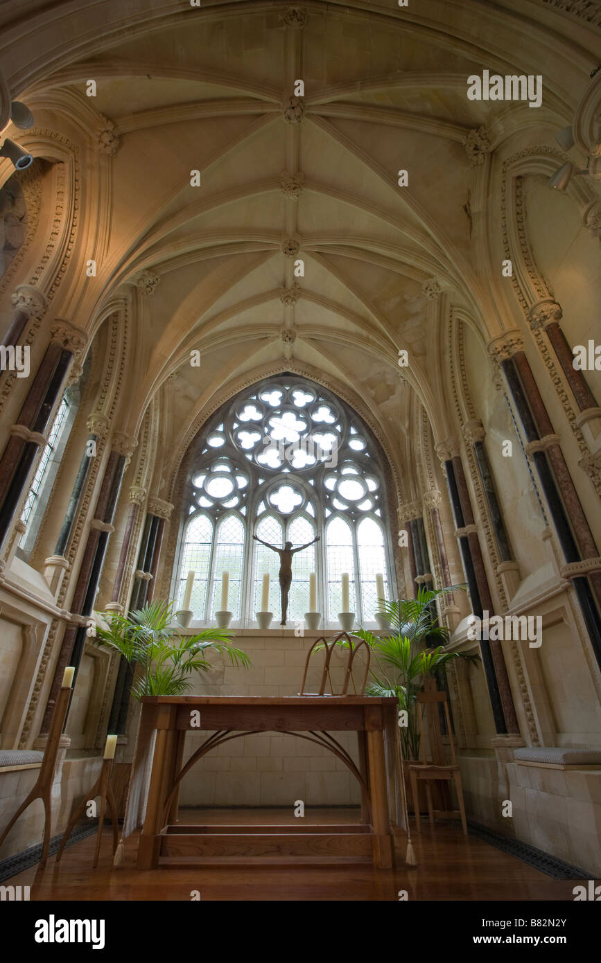 Christ and Altar. A sculpture of a crucified Christ framed by large ...