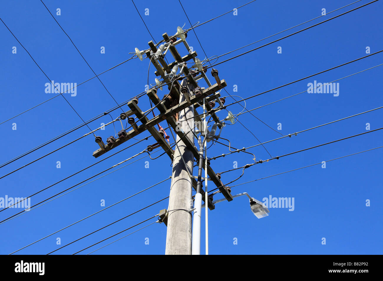 Close up of wooden power pole with lines.Timaru,Canterbury,South Island ...