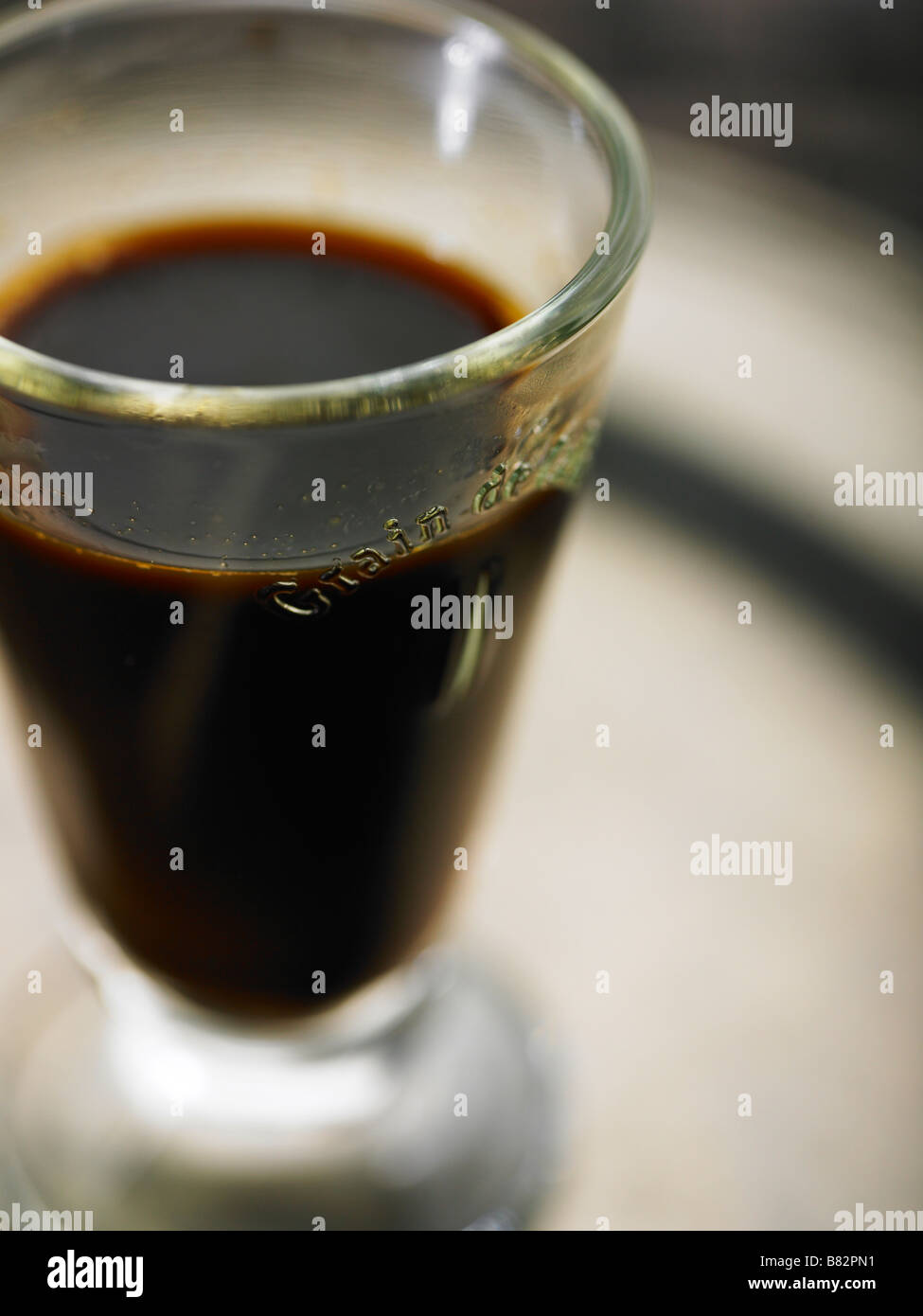 single shot of coffee at cafe in a tapered glass Stock Photo - Alamy