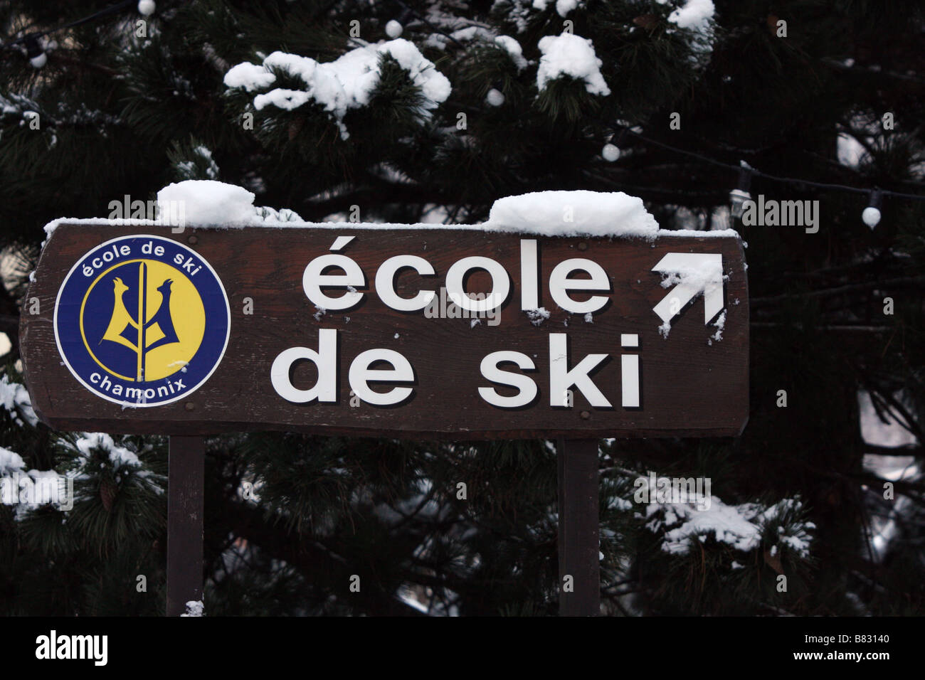 French street sign pointing to a school of ski in Chamonix Mont Blanc ...