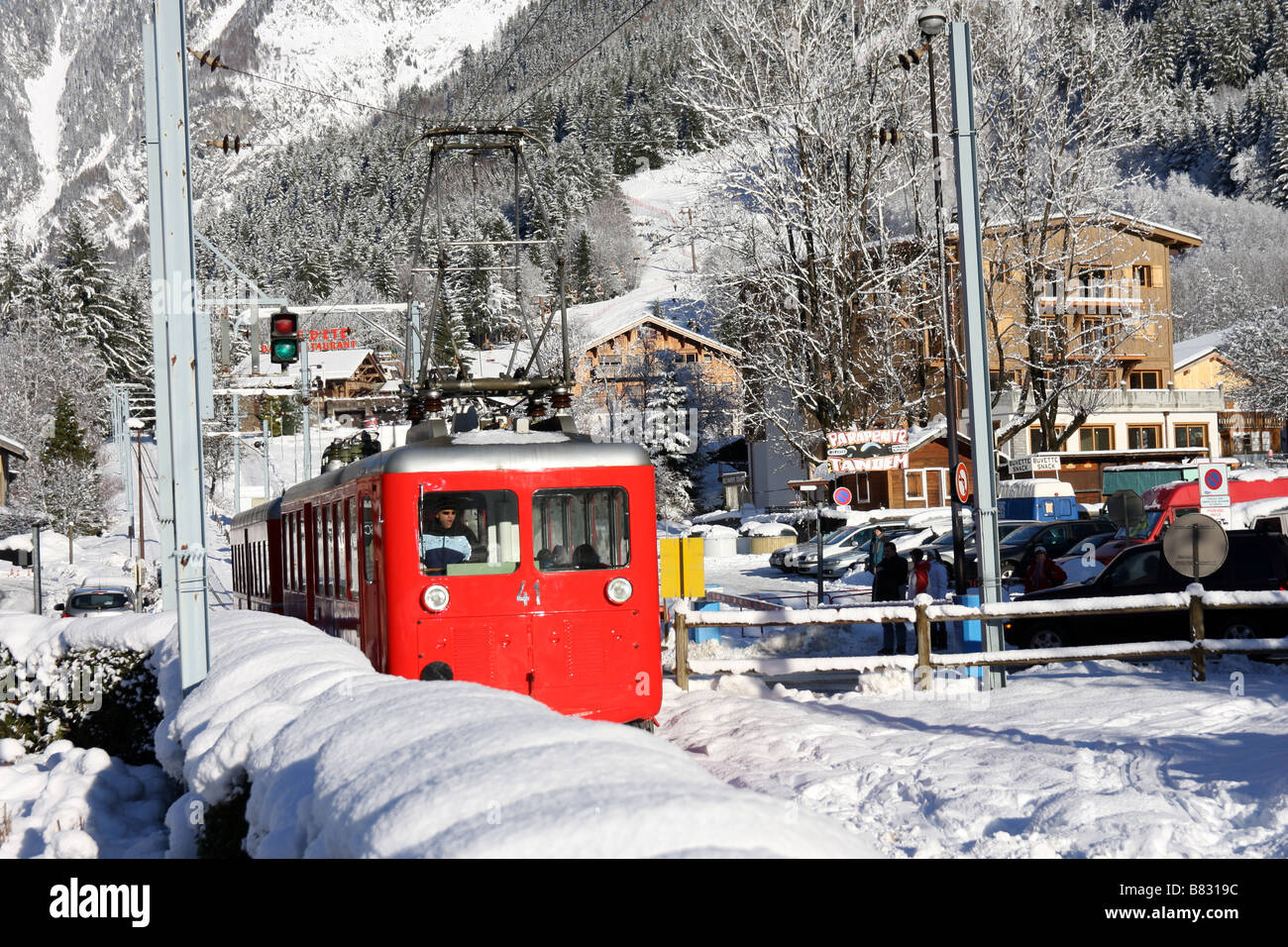 Rack railway red train departing from Chamonix following the chemin de ...
