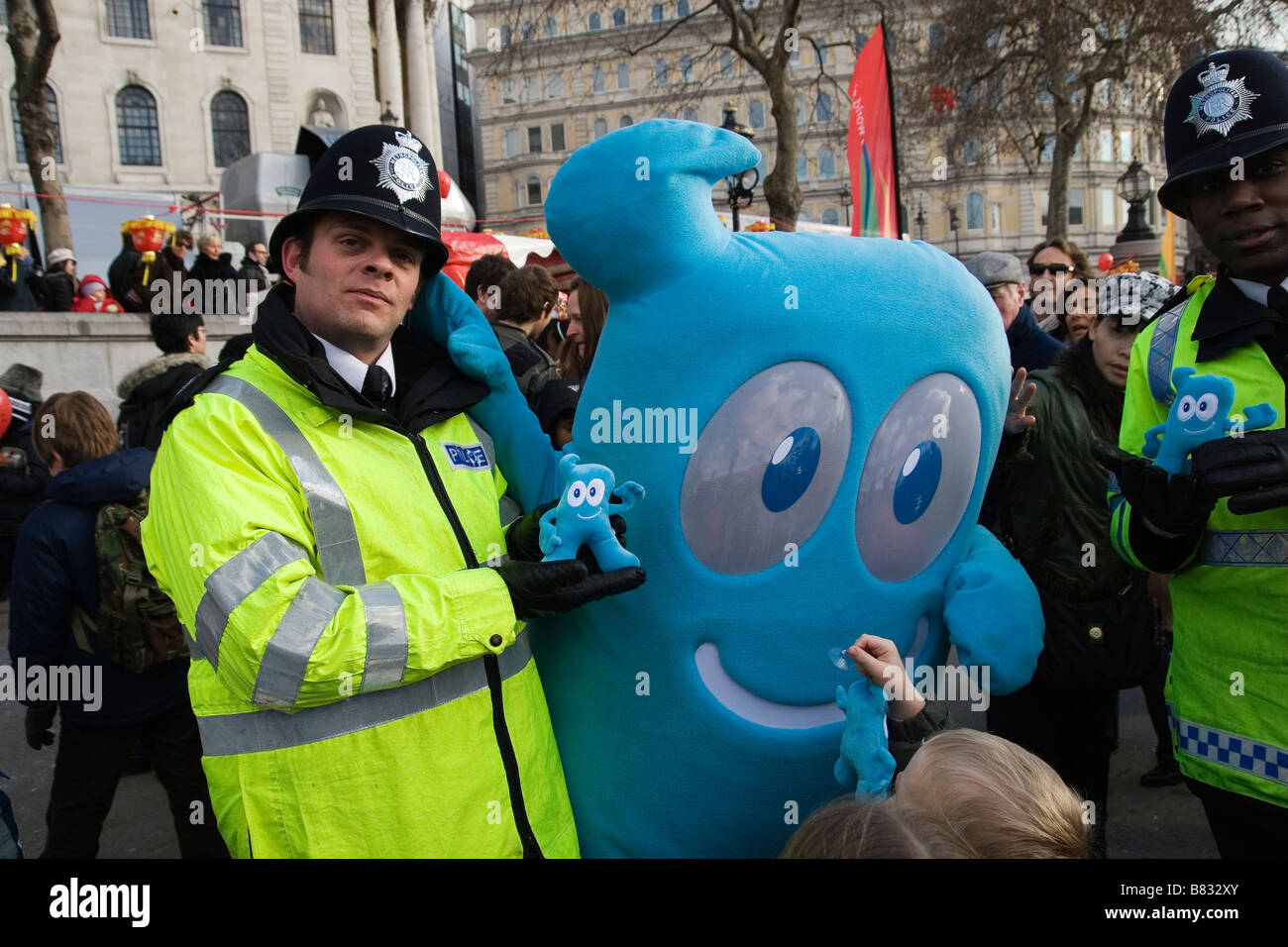 Metropolitan Police Officer in London holding a toy of the 2010 ...
