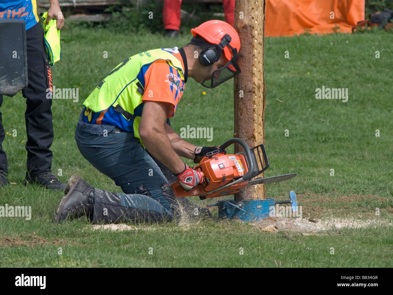 woodcutting competition with chainsaw Stock Photo - Alamy