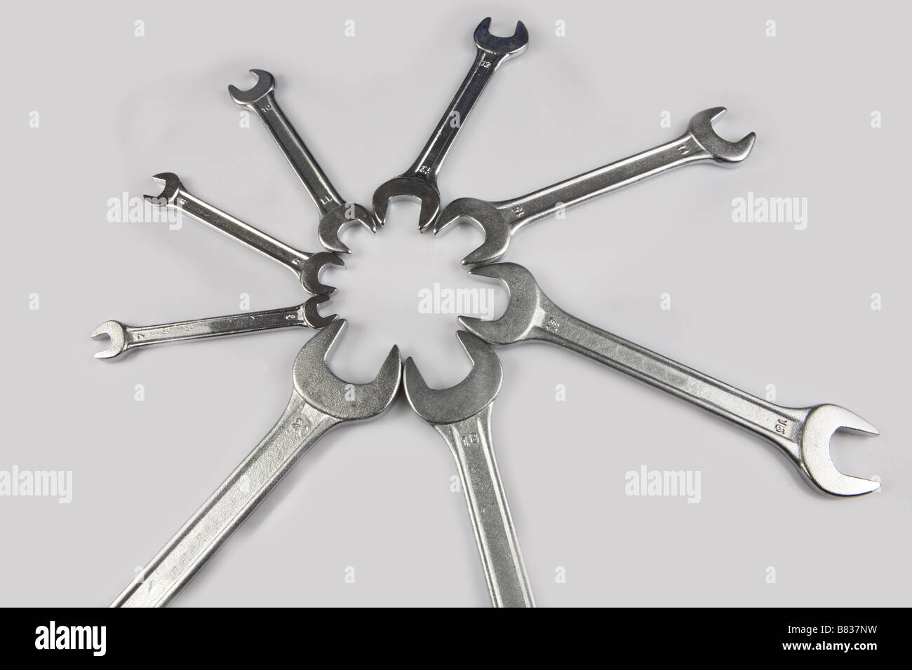 Different sizes of spanners arranged Stock Photo - Alamy