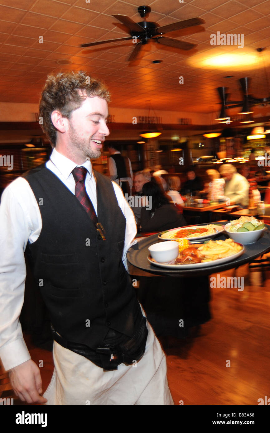 Busy restaurant waiter serving hi-res stock photography and images - Alamy