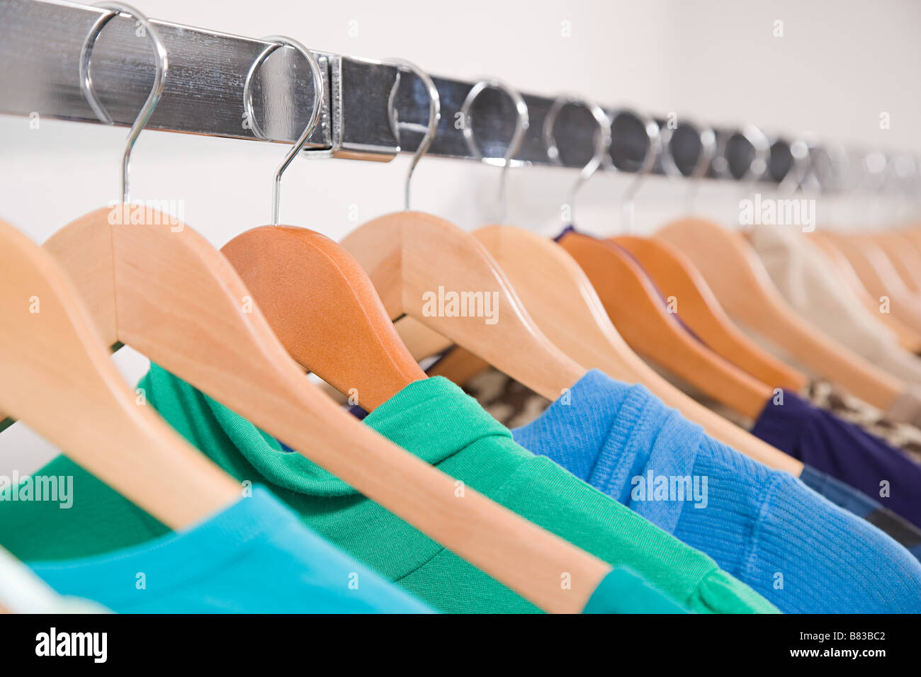 Clothes on a rail Stock Photo - Alamy