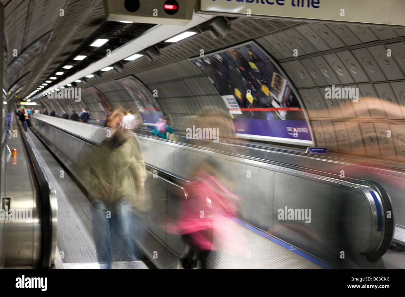 London Underground people and machines Stock Photo - Alamy