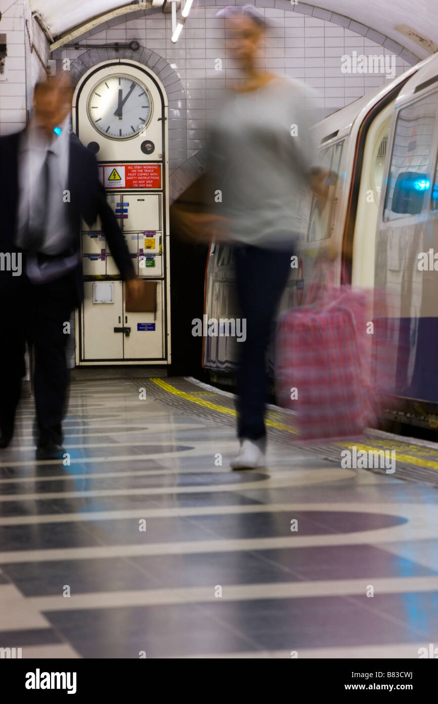 London Underground people and machines Stock Photo - Alamy