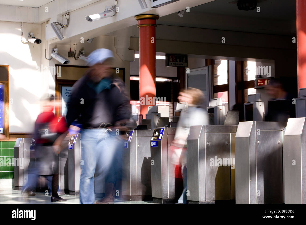 London Underground people and machines Stock Photo - Alamy